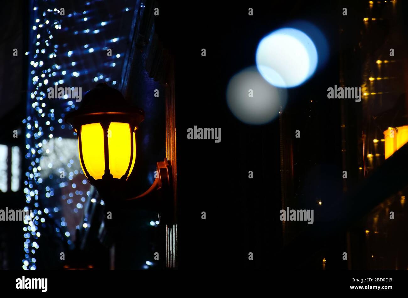 Beautiful yellow light and small white lights before christmas Stock ...