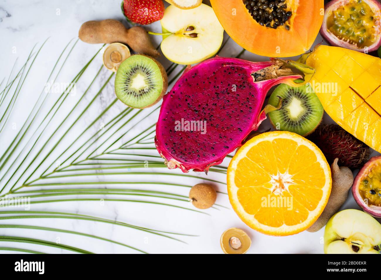 Set of exotic tropical fruits. Papaya, mango, dragon fruit, passion ...