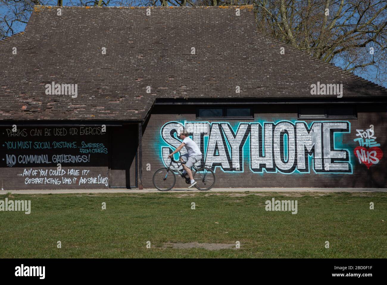 Signs warning public to practice social distancing Stock Photo - Alamy