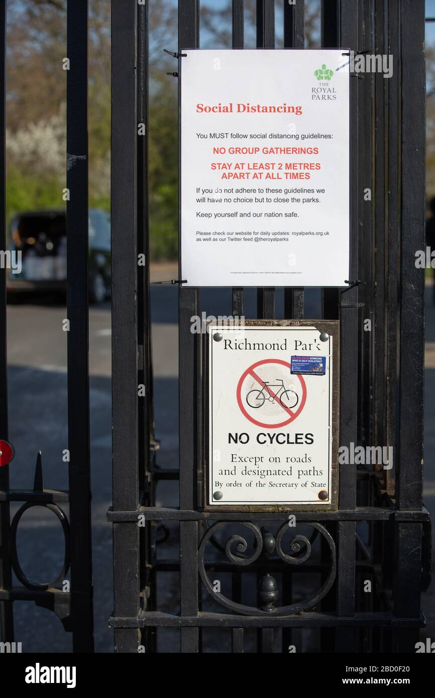 Signs warning public to practice social distancing Stock Photo - Alamy