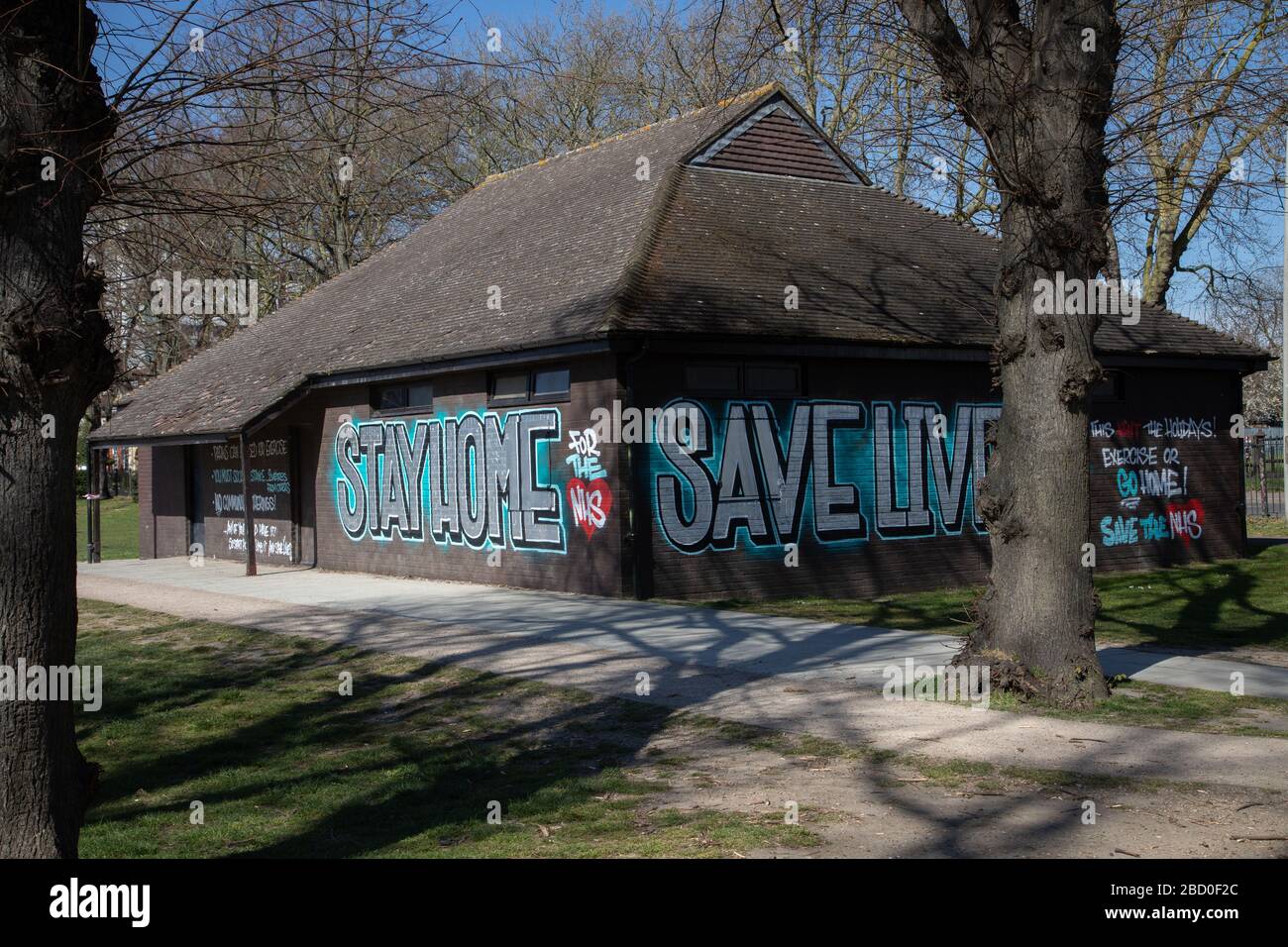 Signs warning public to practice social distancing Stock Photo - Alamy