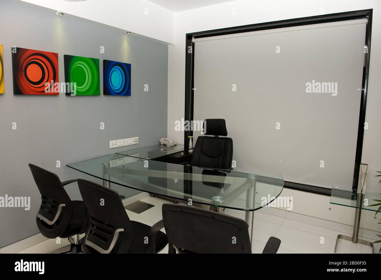 Modern manager office interior with a Blue walls, a stylish table ...