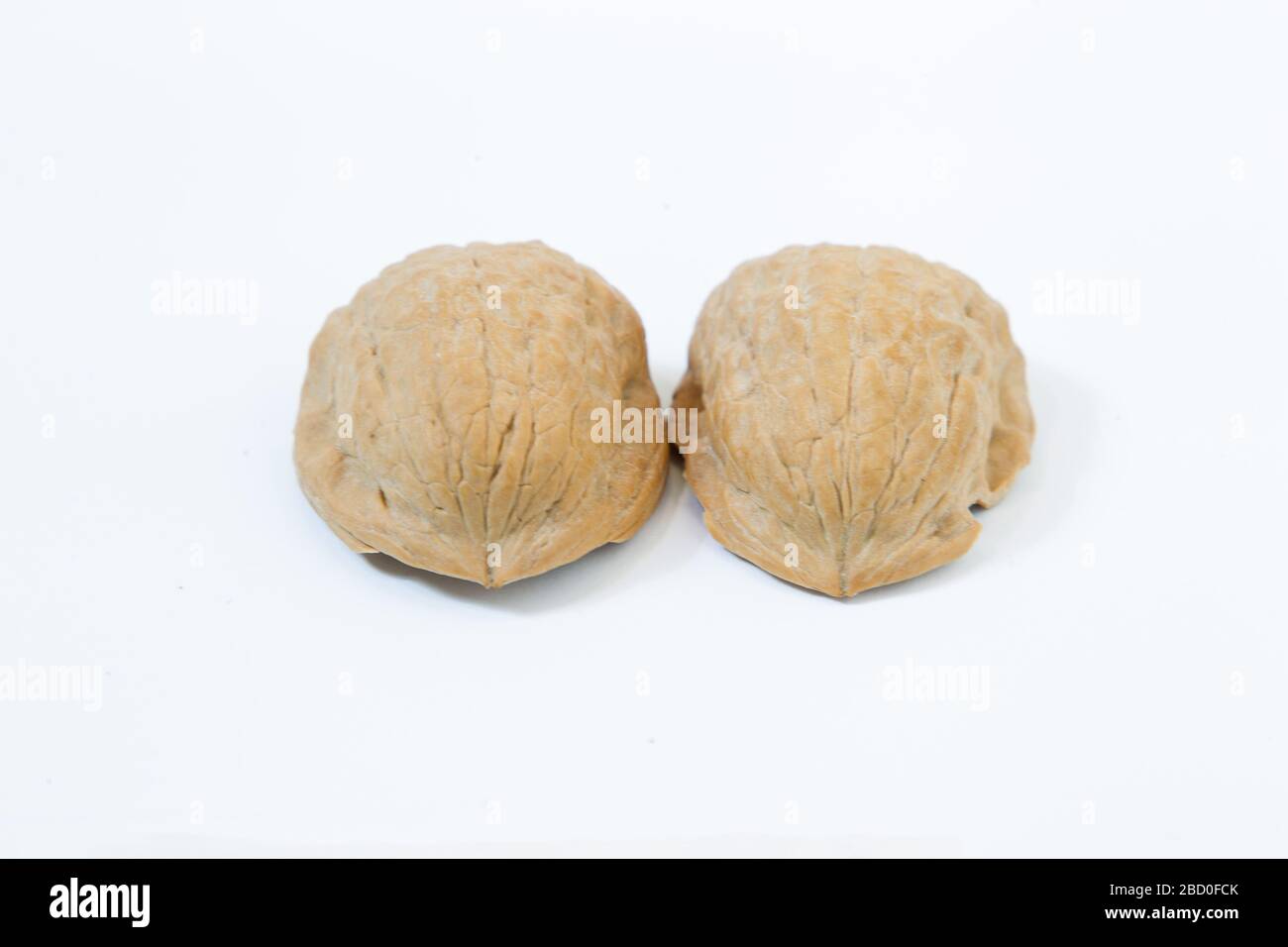 nuts with shell and without Stock Photo - Alamy