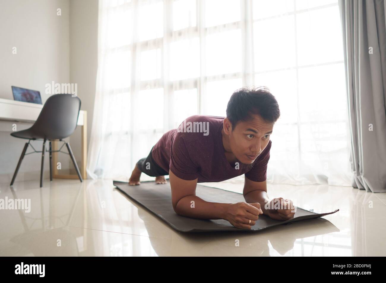 asian man doing workout sport plank at home Stock Photo - Alamy