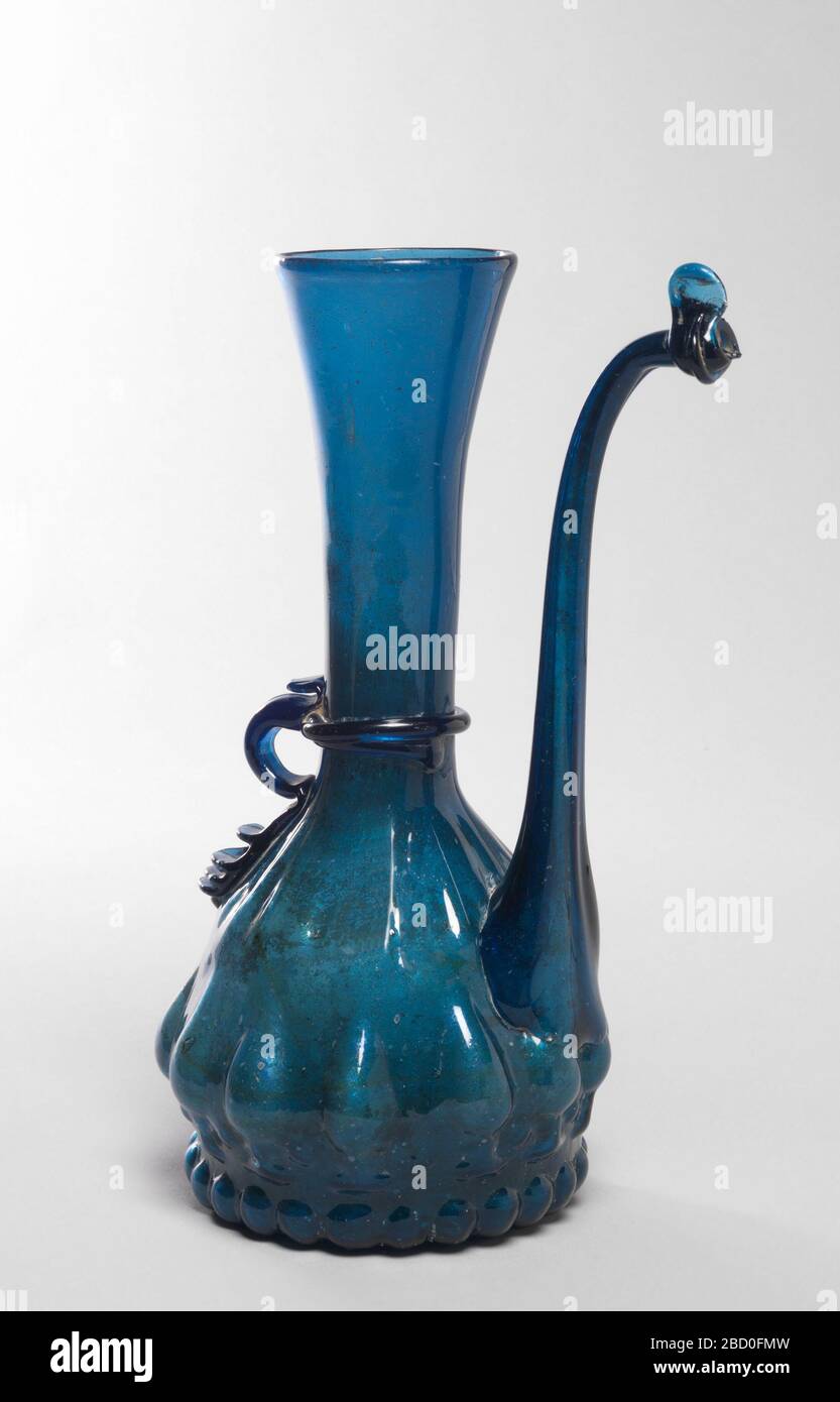 Ewer. Research in ProgressBlue glass vessel with long flaring neck and ...