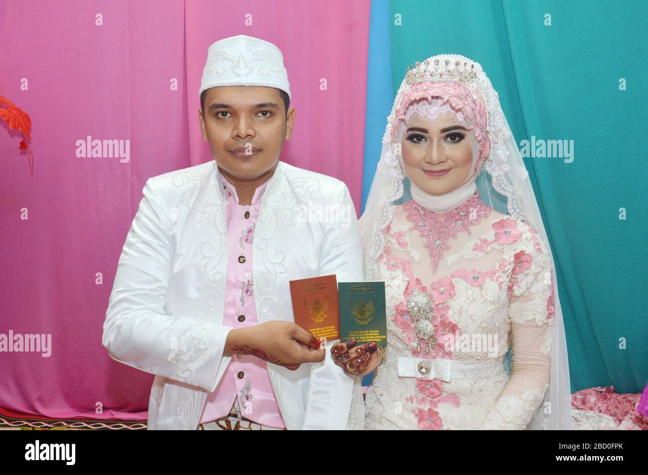 Green brown indonesian marriage book hi-res stock photography and ...