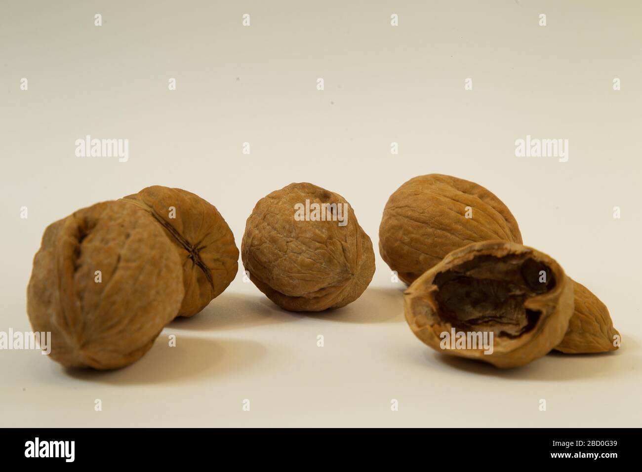 nuts with shell and without Stock Photo - Alamy