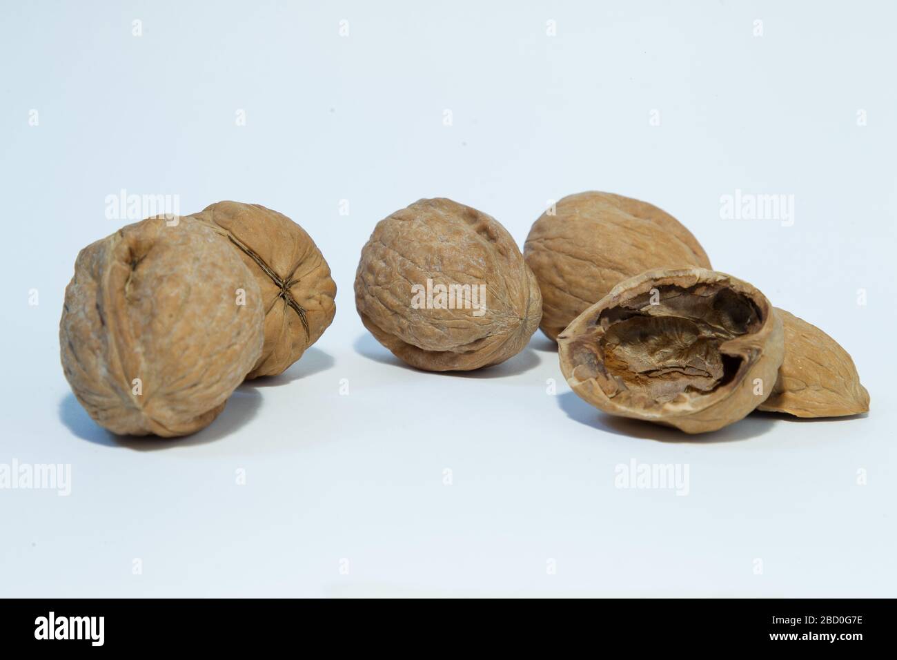 nuts with shell and without Stock Photo - Alamy