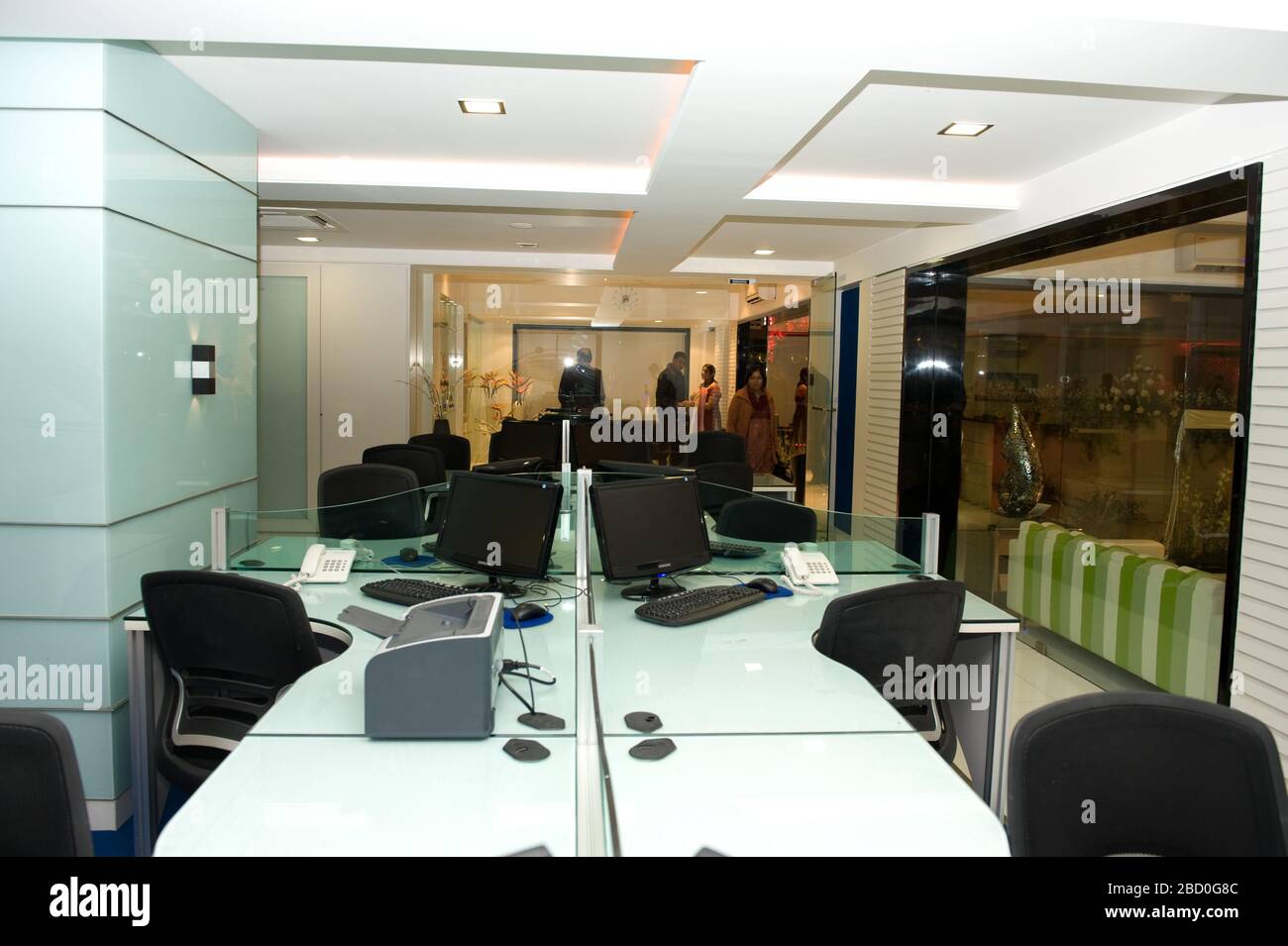 Side view of Working space office interior with white walls, carpet on ...