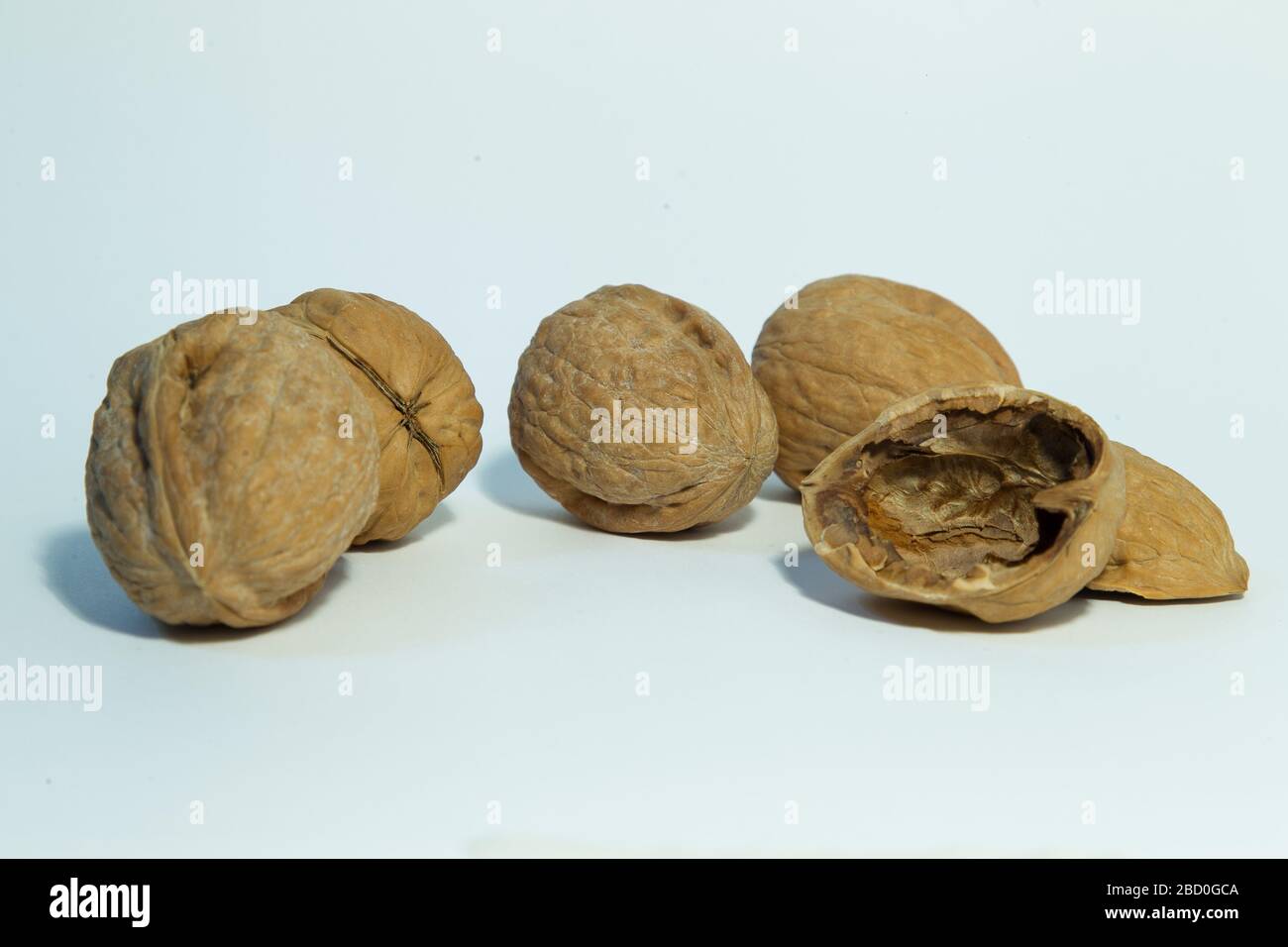 nuts with shell and without Stock Photo - Alamy