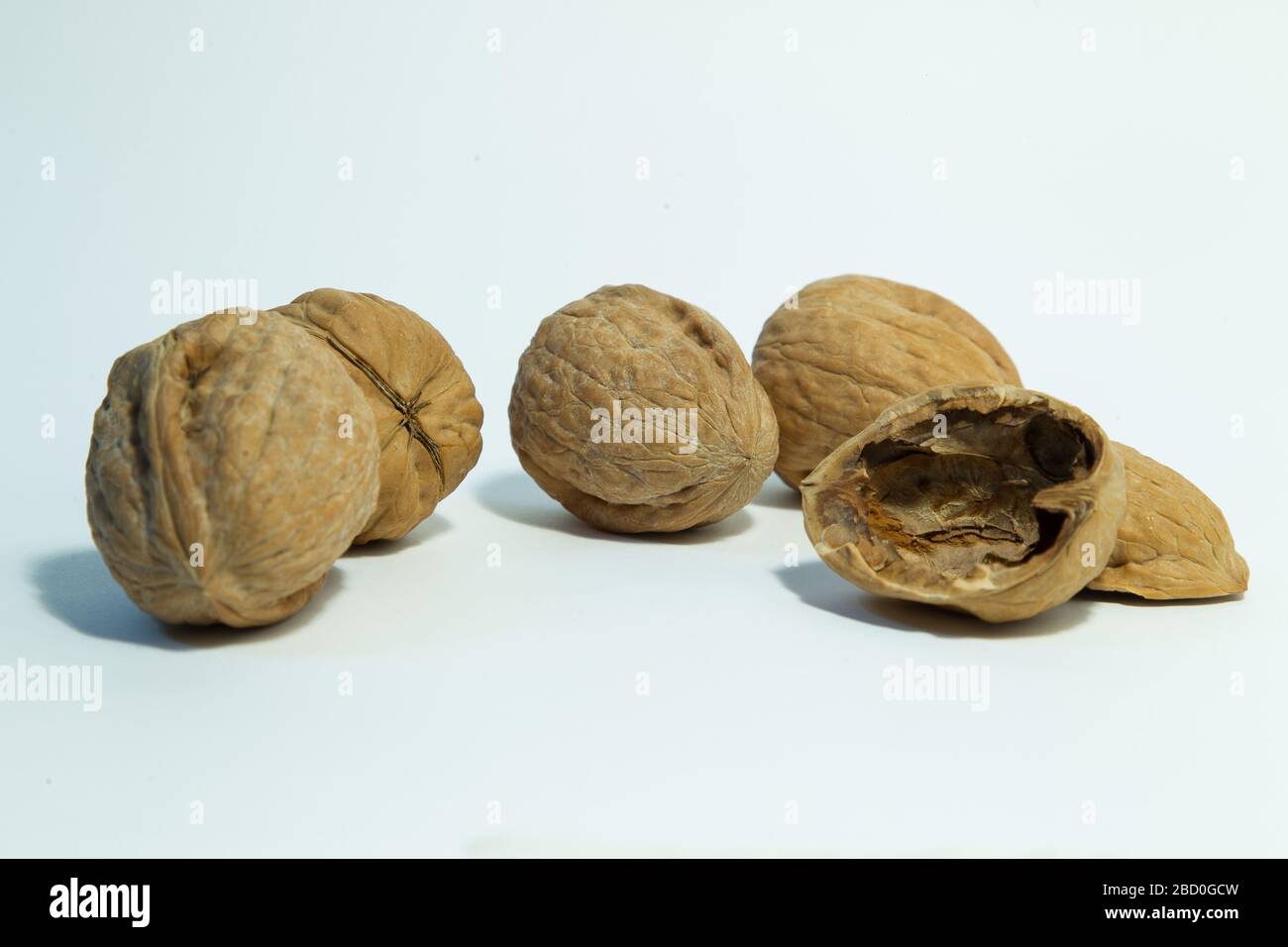 nuts with shell and without Stock Photo - Alamy