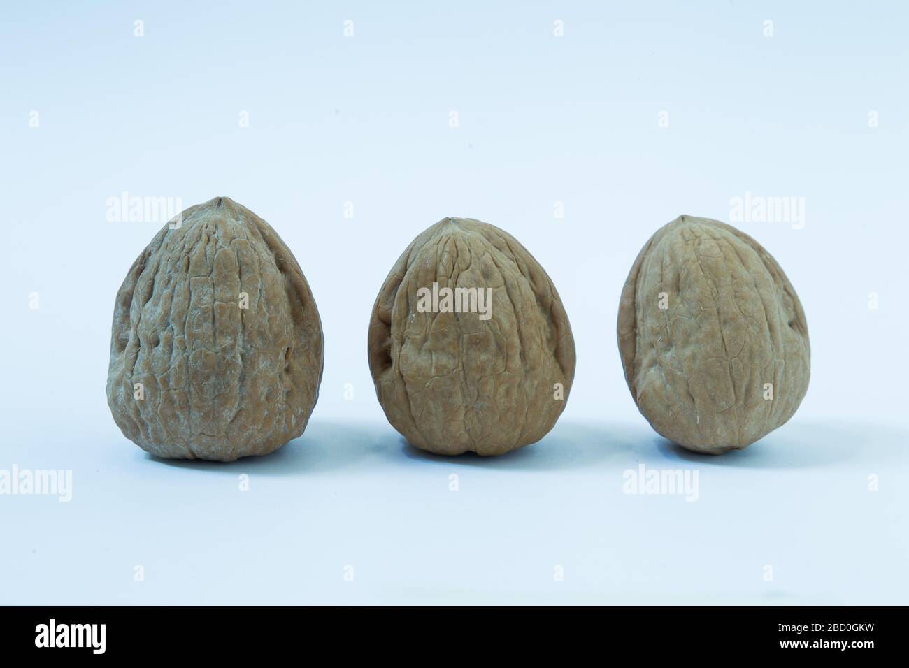 nuts with shell and without Stock Photo - Alamy