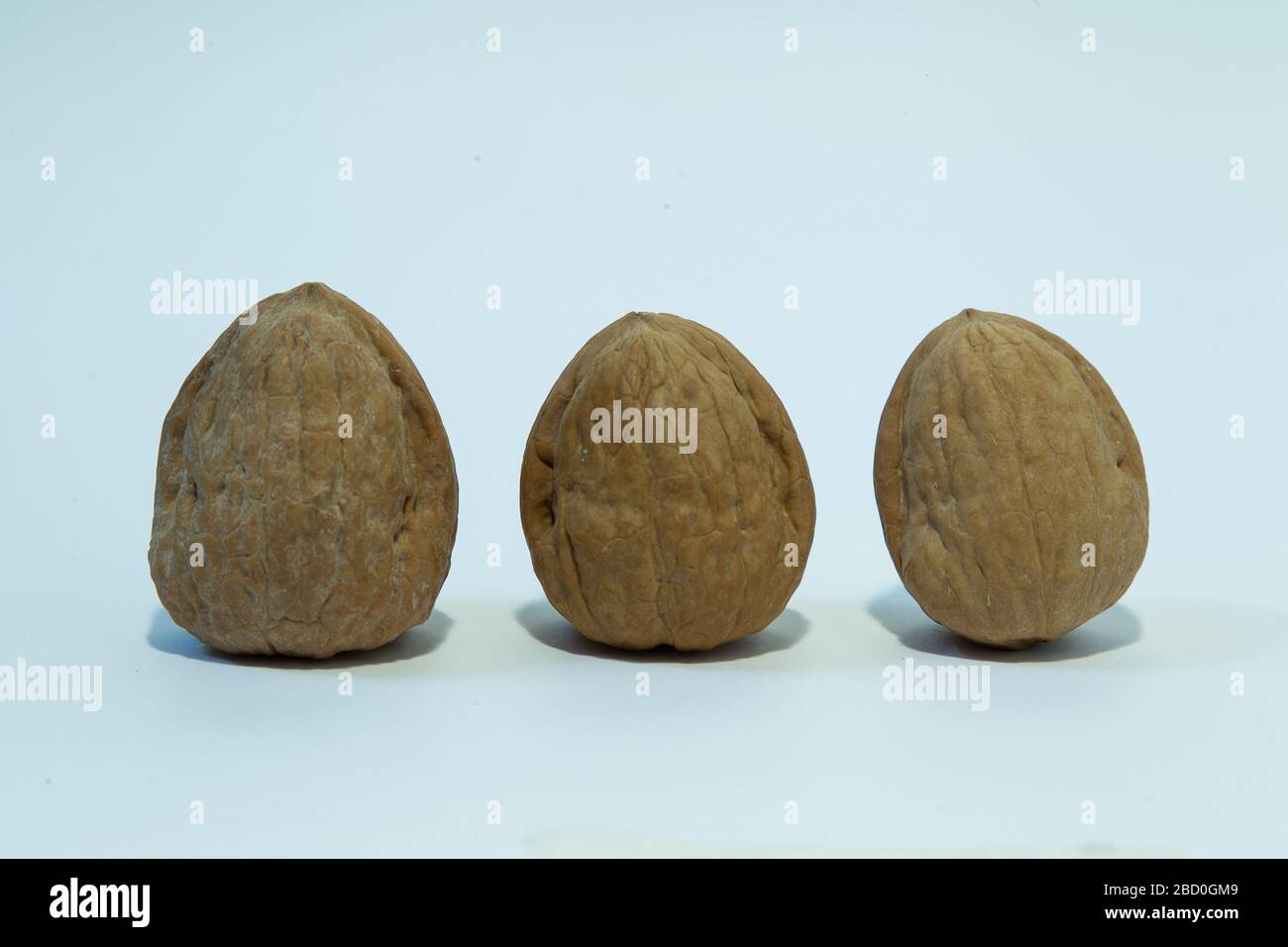 nuts with shell and without Stock Photo - Alamy