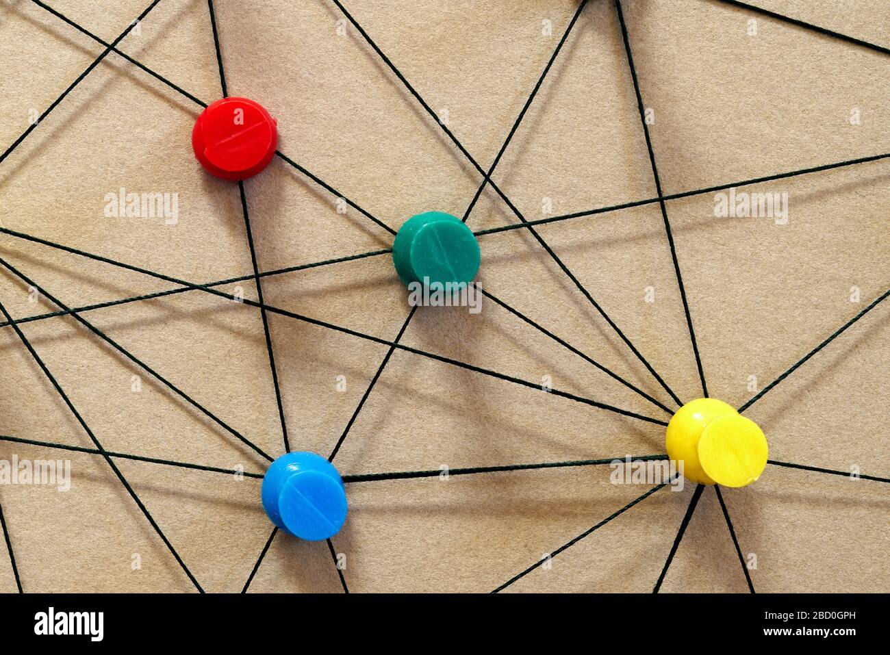 Close up of push pins connected with strings Stock Photo - Alamy