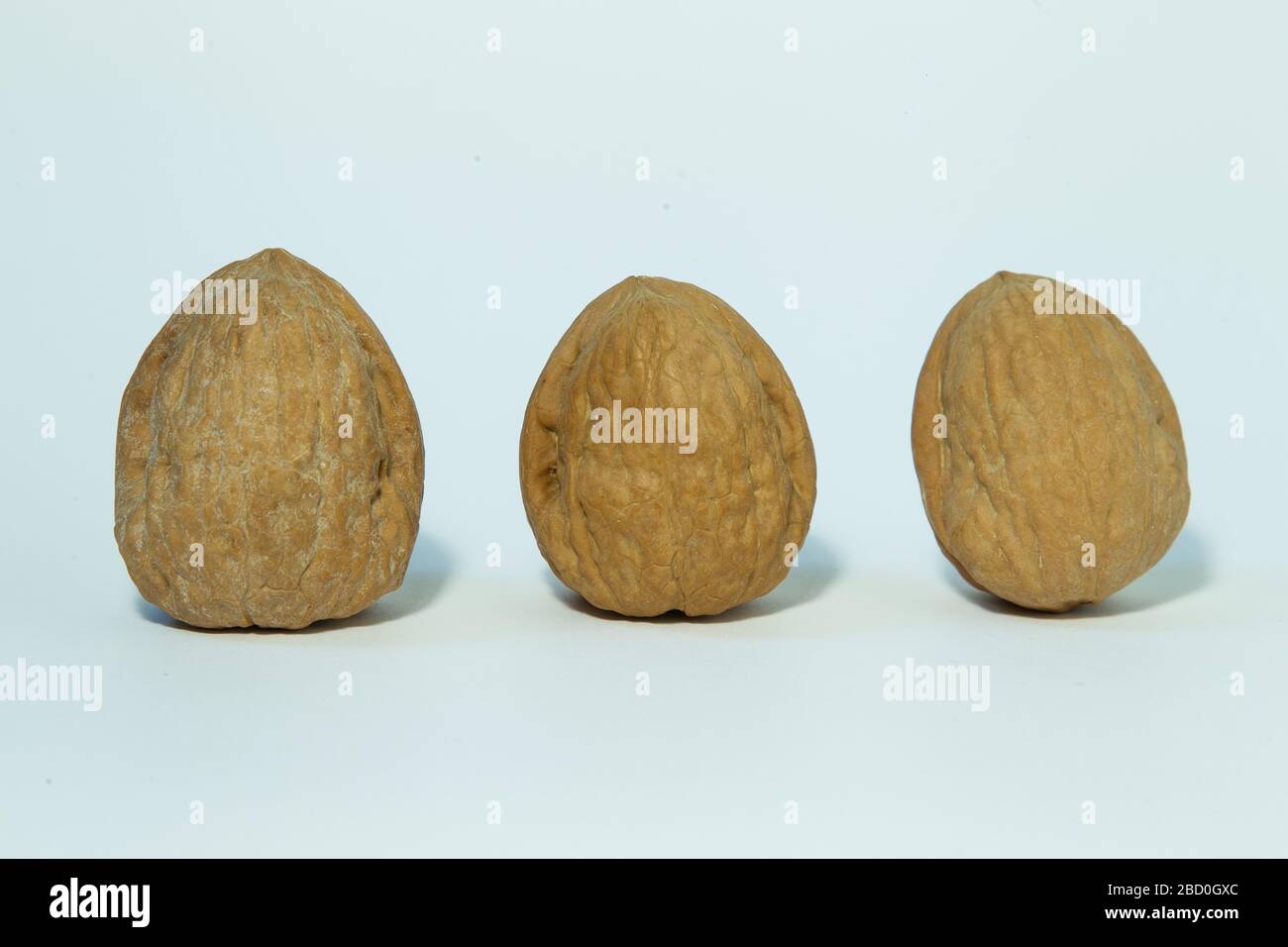 nuts with shell and without Stock Photo - Alamy
