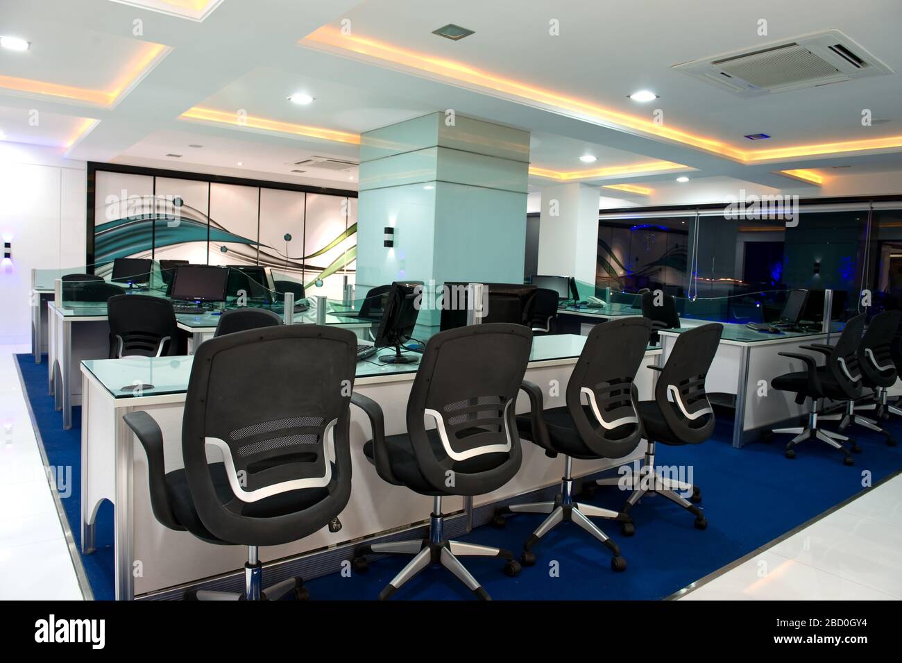 Side view of Working space office interior with white walls, carpet on ...