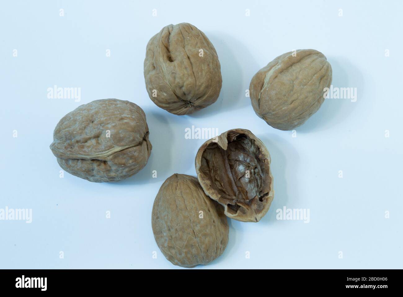 nuts with shell and without Stock Photo - Alamy