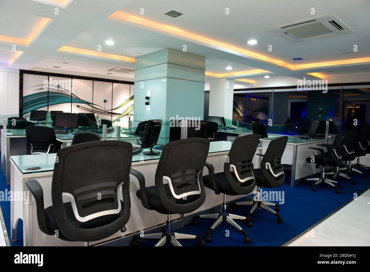 Side view of Working space office interior with white walls, carpet on ...