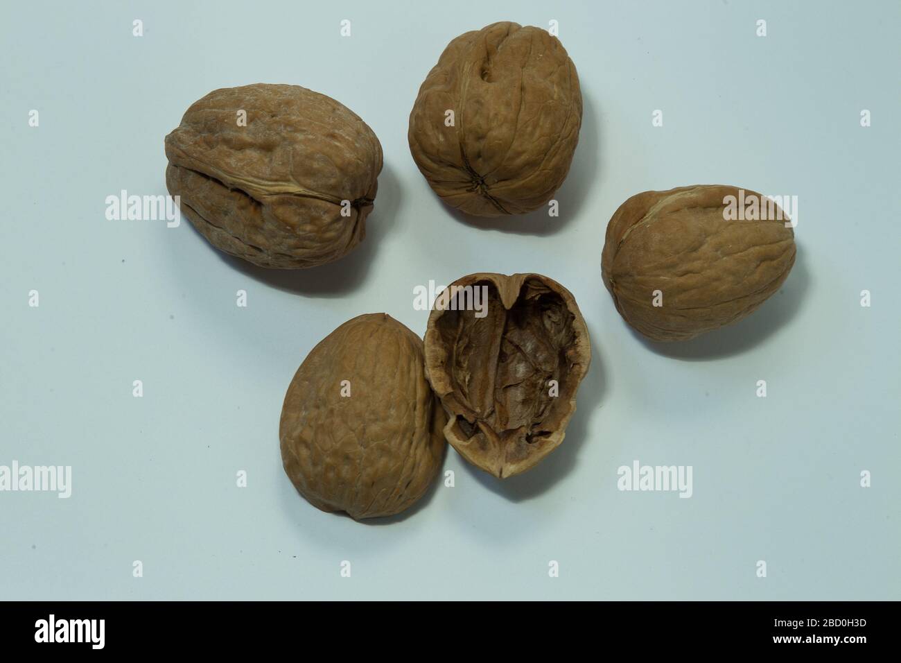 nuts with shell and without Stock Photo - Alamy
