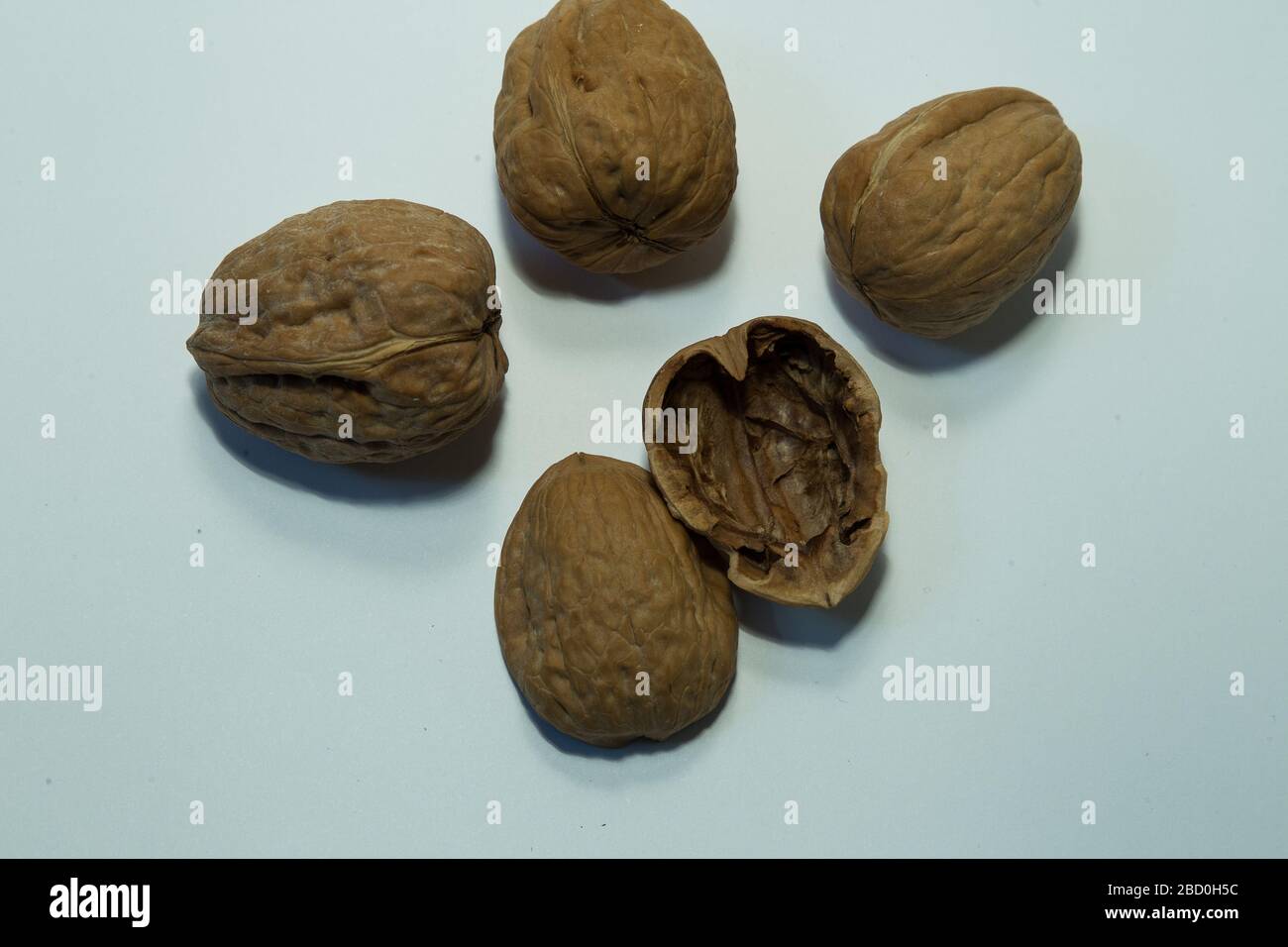 nuts with shell and without Stock Photo - Alamy