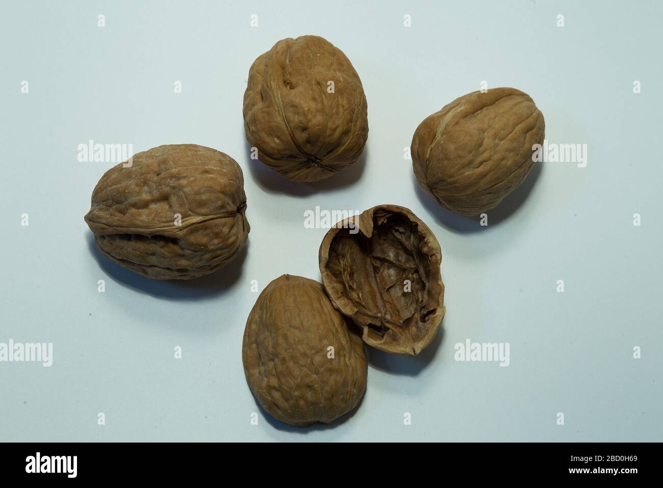 nuts with shell and without Stock Photo - Alamy