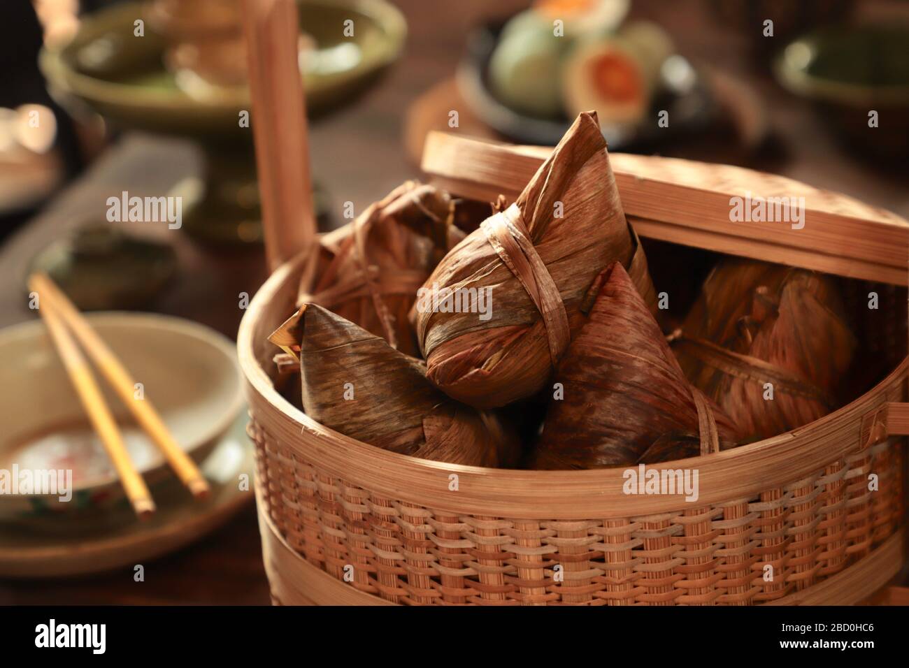 ZongZi. Chinese steamed glutinous rice dumpling in bamboo leaf wrapping ...