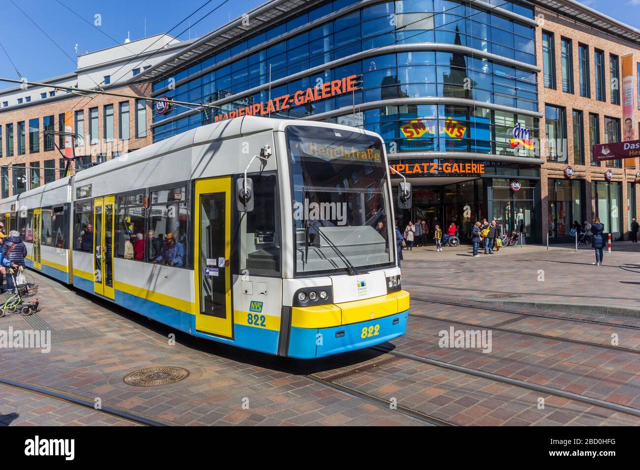 Tram in front of the shopping mall on Marienplatz square in Schwerin ...