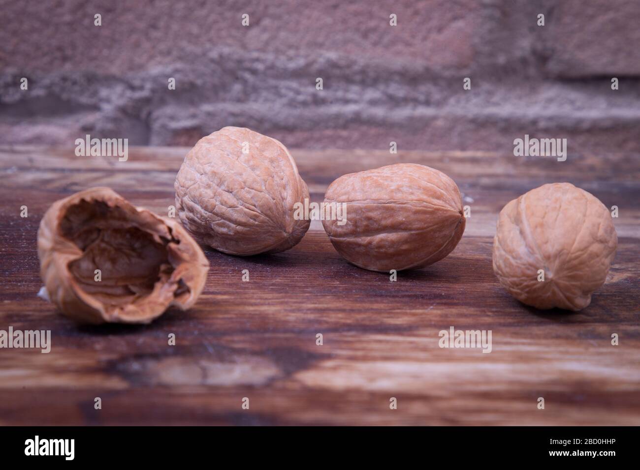 nuts with shell and without Stock Photo - Alamy