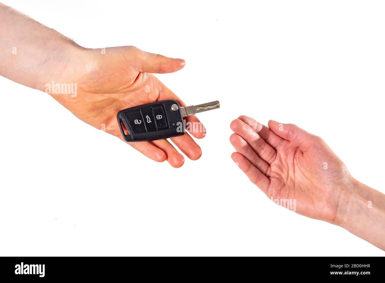 Person hands over car keys isolated on a white background Stock Photo ...