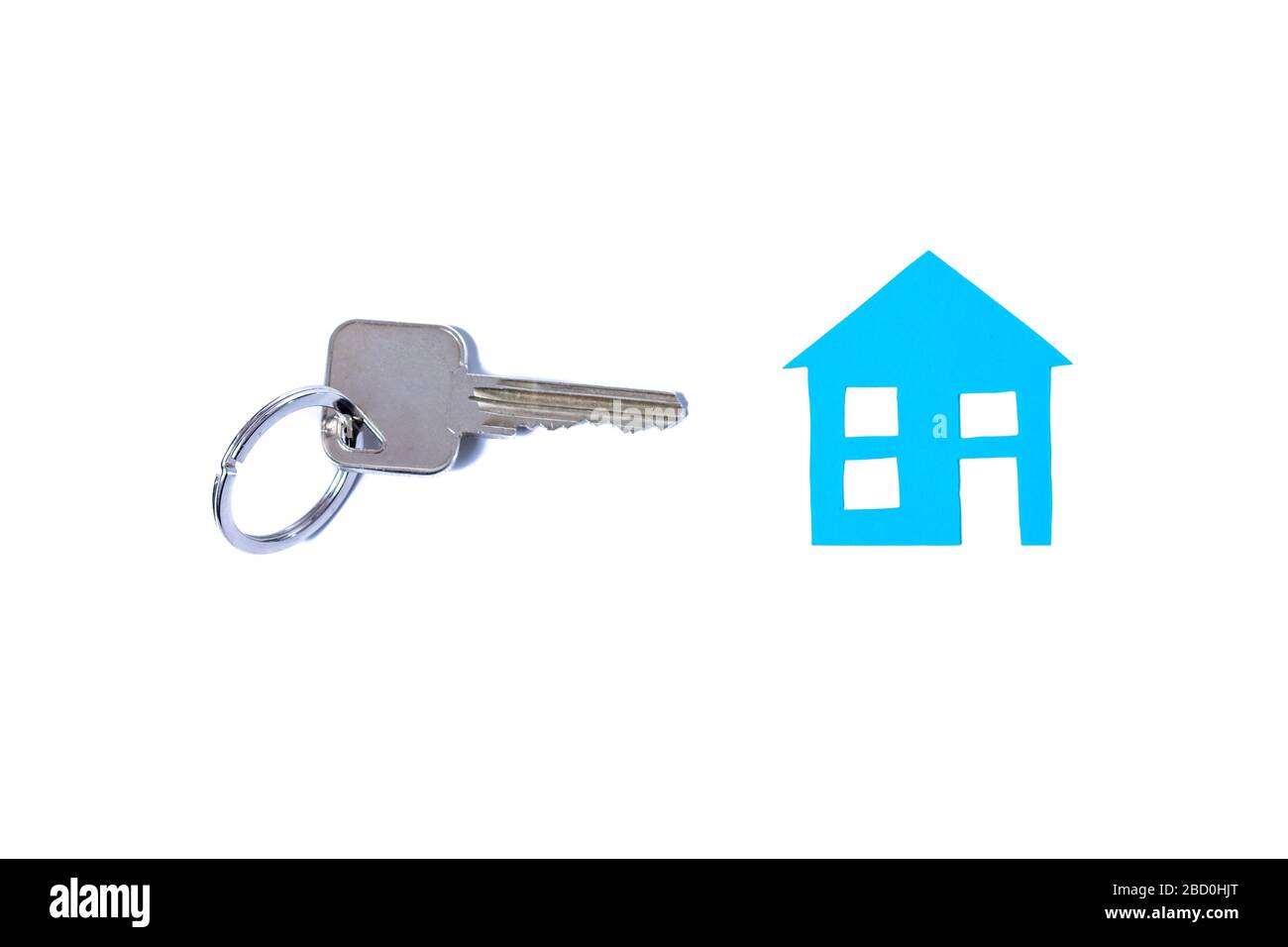 A blue house and keys isolated on a white background Stock Photo - Alamy