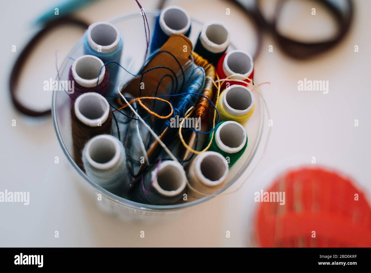 closeup photo of multicolored ribbons to sew Stock Photo - Alamy
