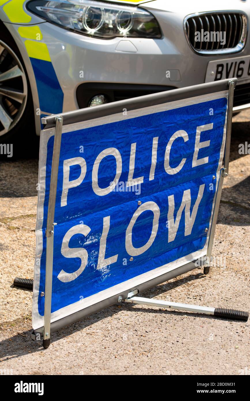 Caution slow car sign hi-res stock photography and images - Alamy