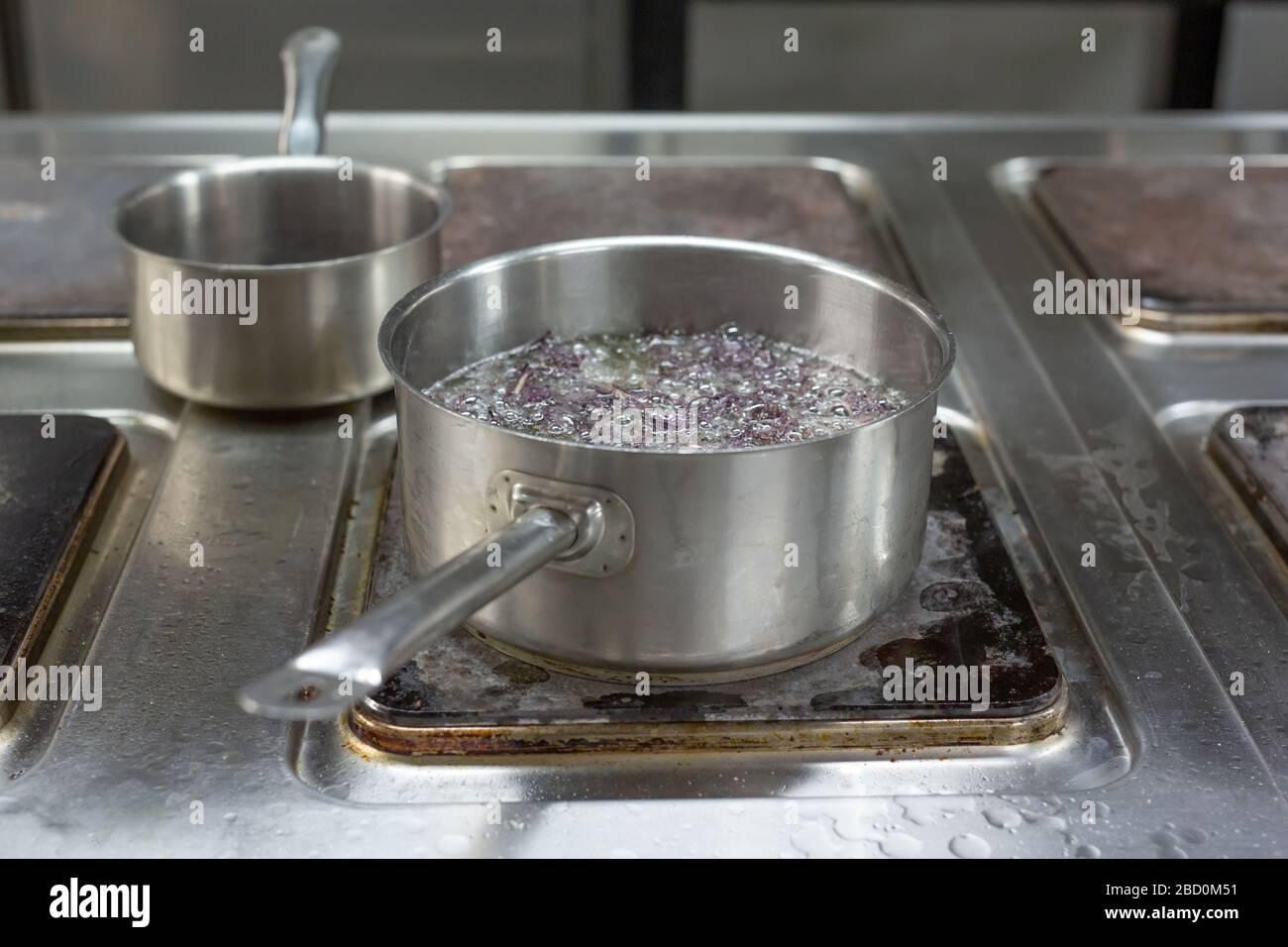 Casserole boiling in a restaurant kitchen Stock Photo - Alamy