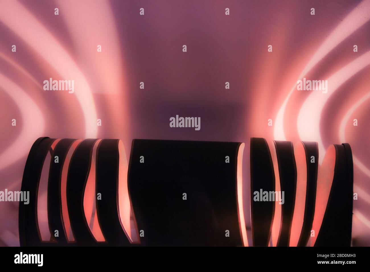 Abstract background of pink light effect and black design structure ...
