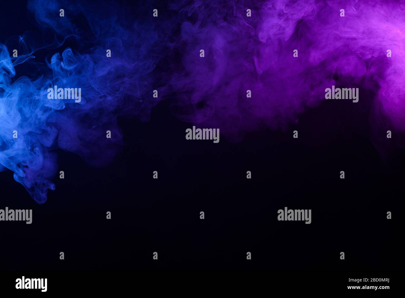 Colorful smoke or fog mist blue and purple border on black background ...