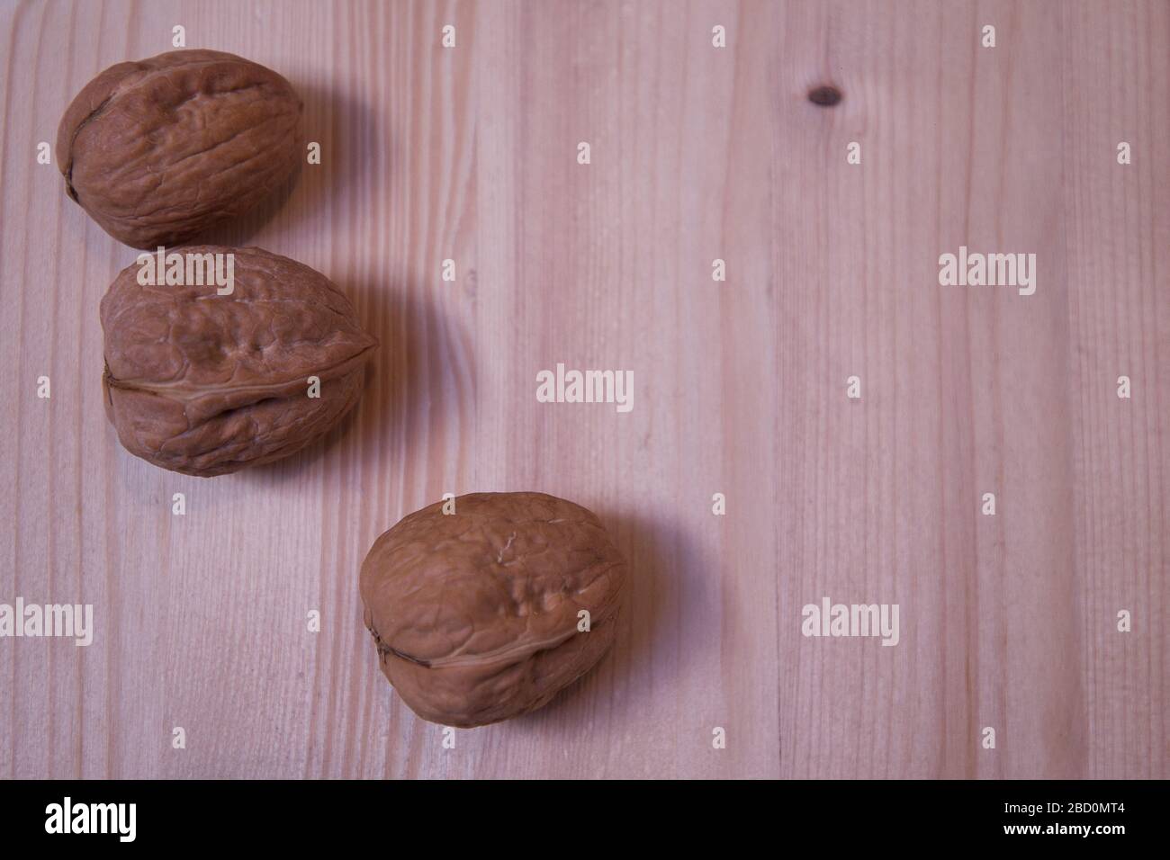 nuts with shell and without Stock Photo - Alamy