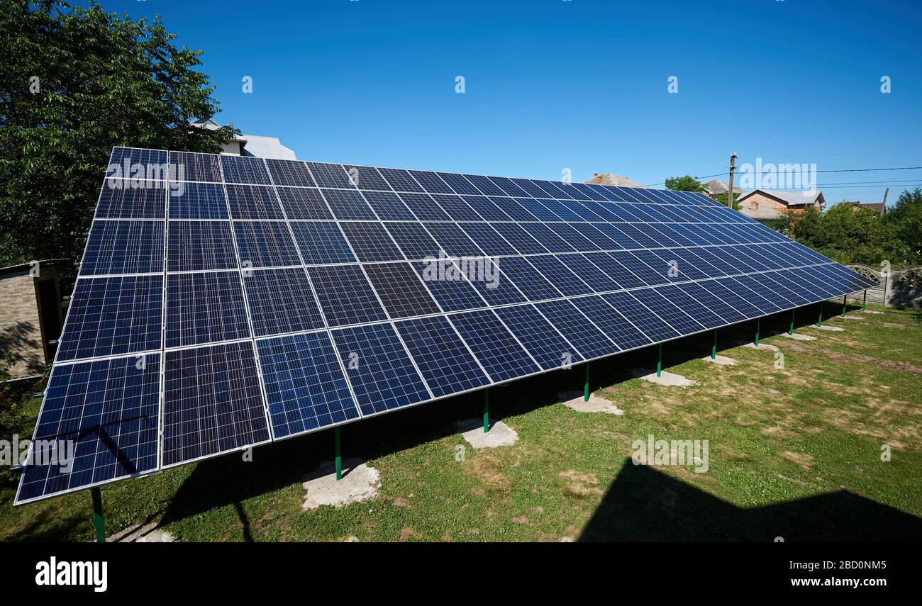 Solar panels installed on outdoors opened space sideview. Modern ...