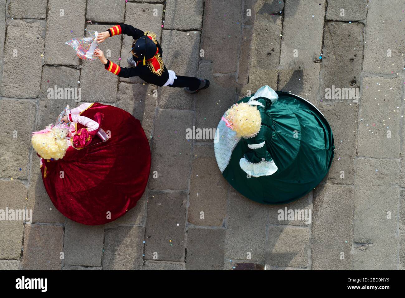 Bright red and green velvet Venetian ballroom gown covered with ...