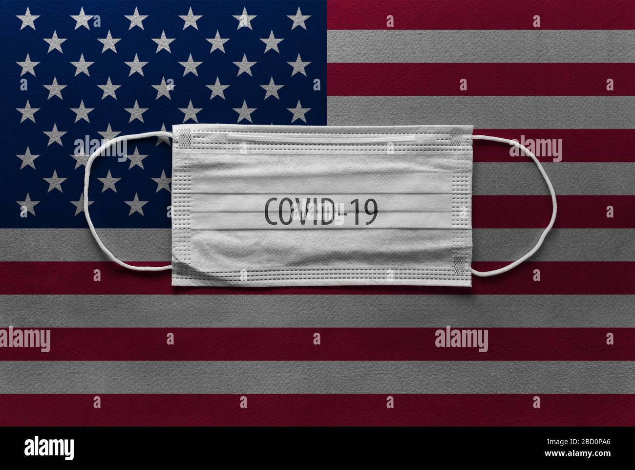An individual face medical surgical mask on United State flag ...