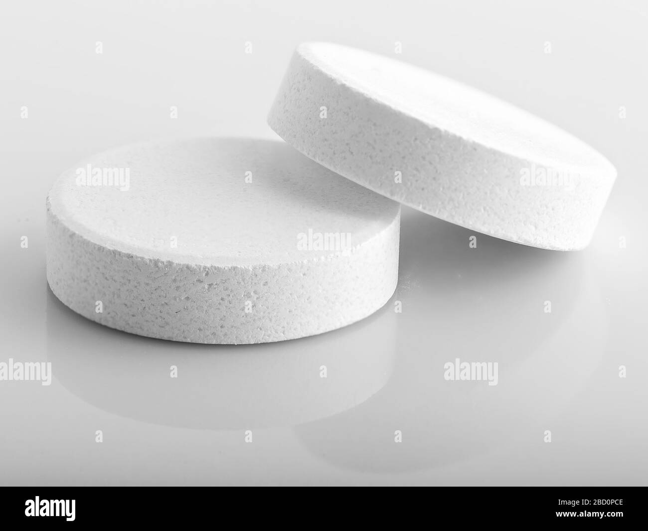 big white medical pill medicine two piece Stock Photo - Alamy