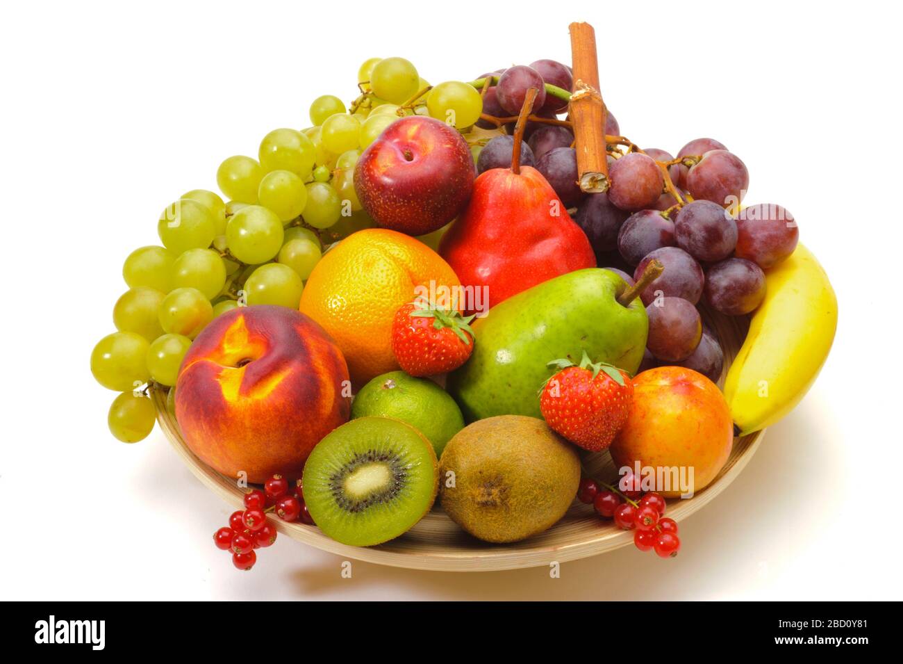 mixed fruit plate on white background Stock Photo - Alamy