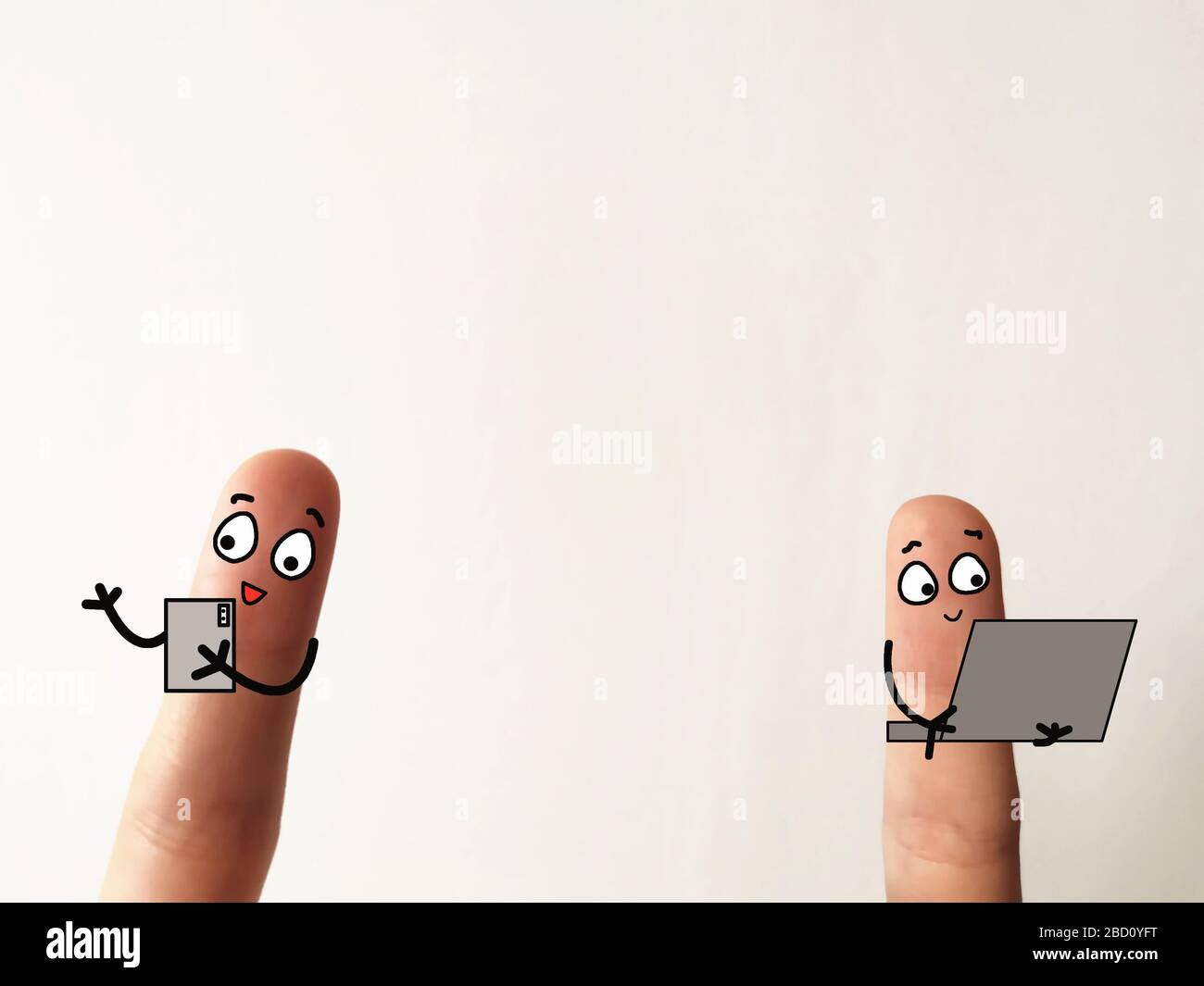Two fingers are decorated as two person. They are having online meeting ...