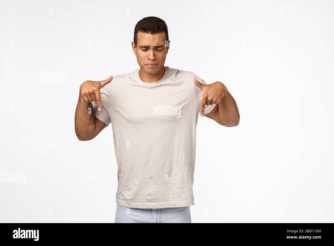 Distressed young hispanic man in hi-res stock photography and images ...