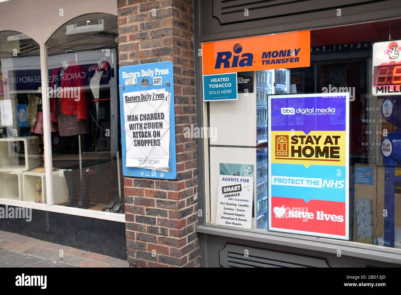 Eastern Daily Press headline next to NHS digital poster in newsagent ...
