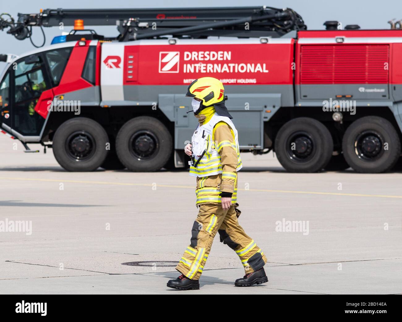 Dresden, Germany. 04th Apr, 2020. A fireman from the airport fire ...