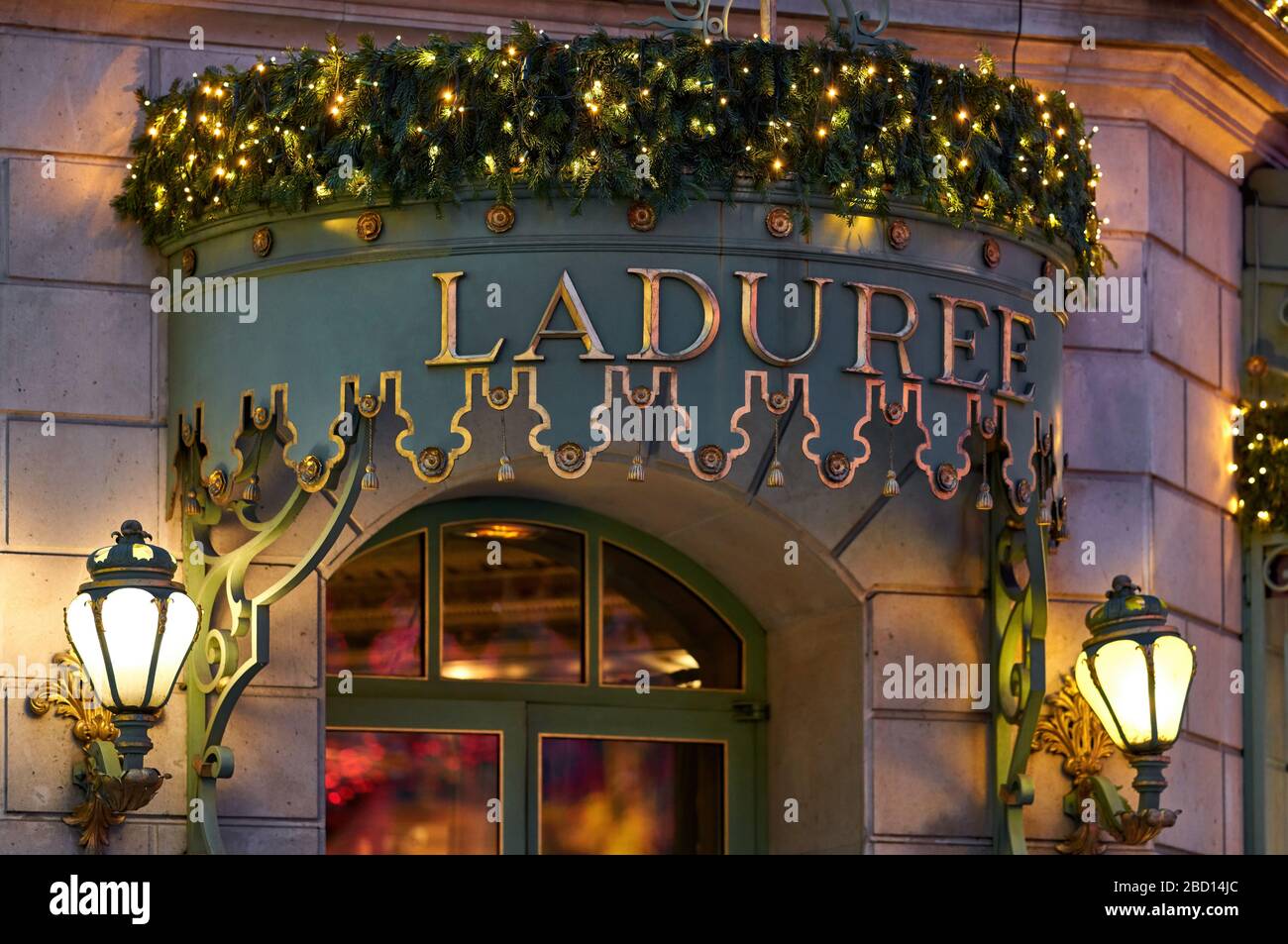 Laduree Champs Elysees. Beautifully lit, elegant entrance to the French ...