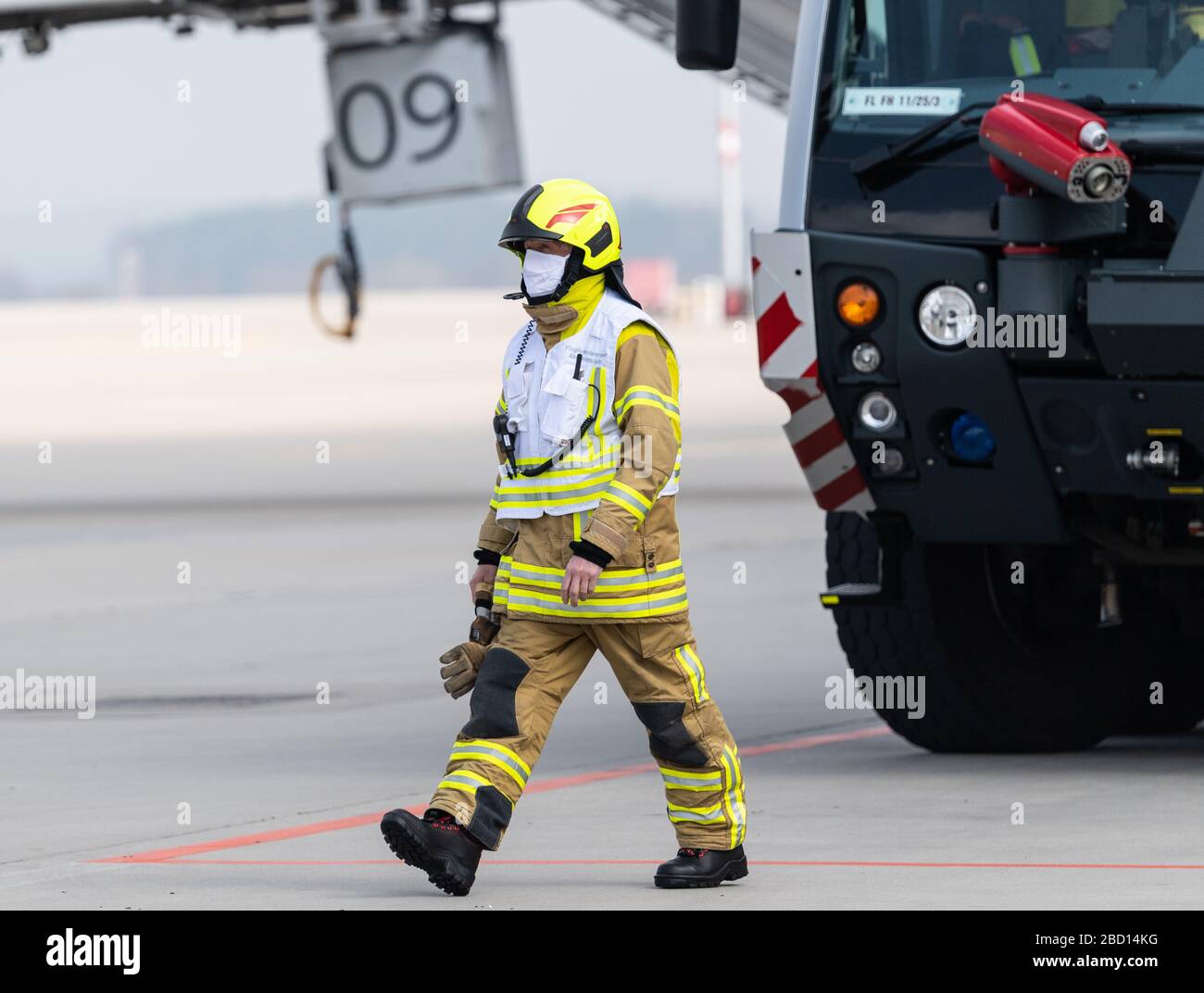 Dresden, Germany. 04th Apr, 2020. A fireman from the airport fire ...