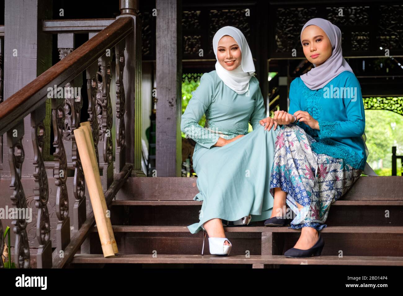 Portrait of Muslim Malay women wearing hijab and traditional costume ...