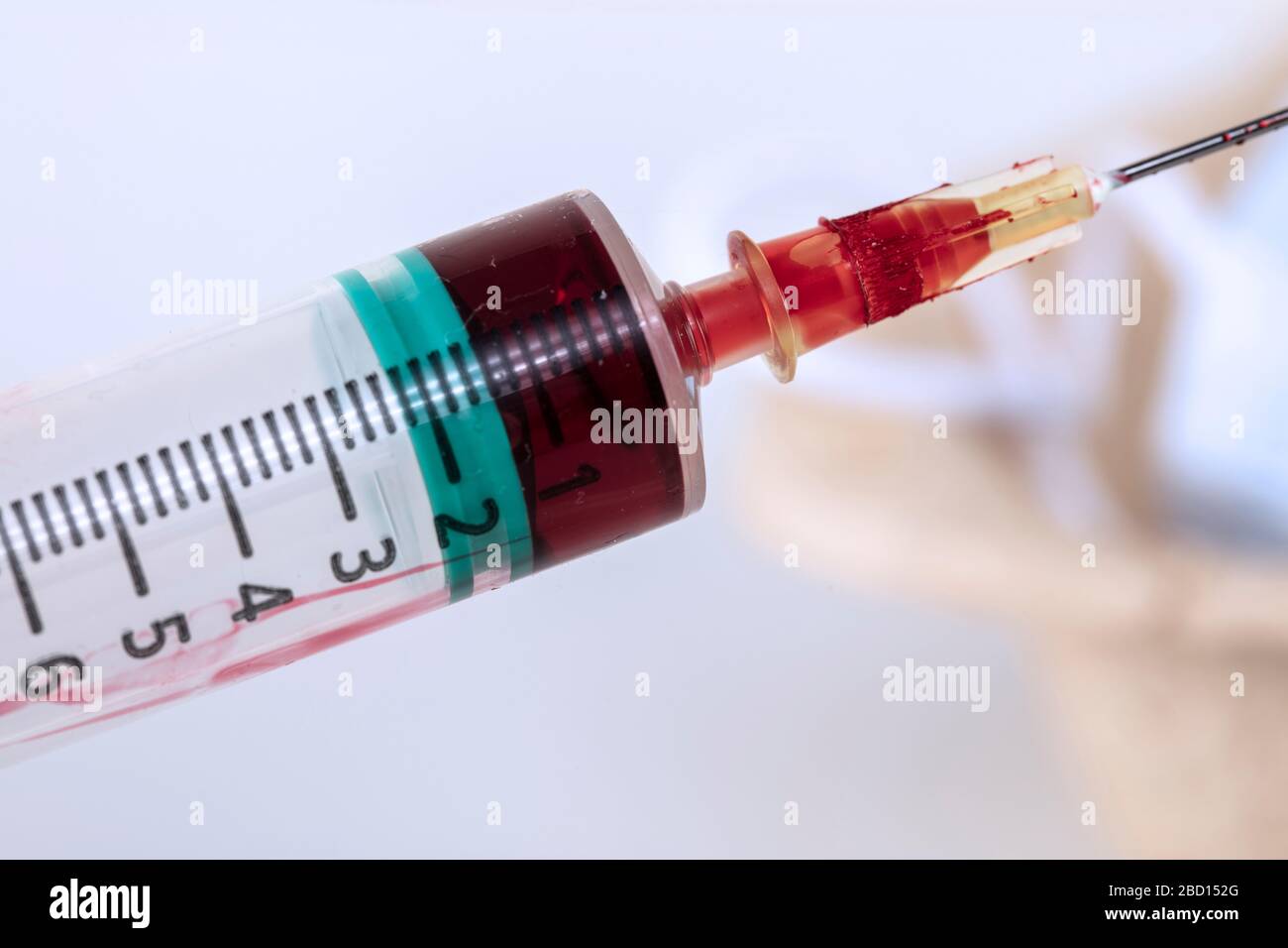 needle filled with red substance Stock Photo - Alamy