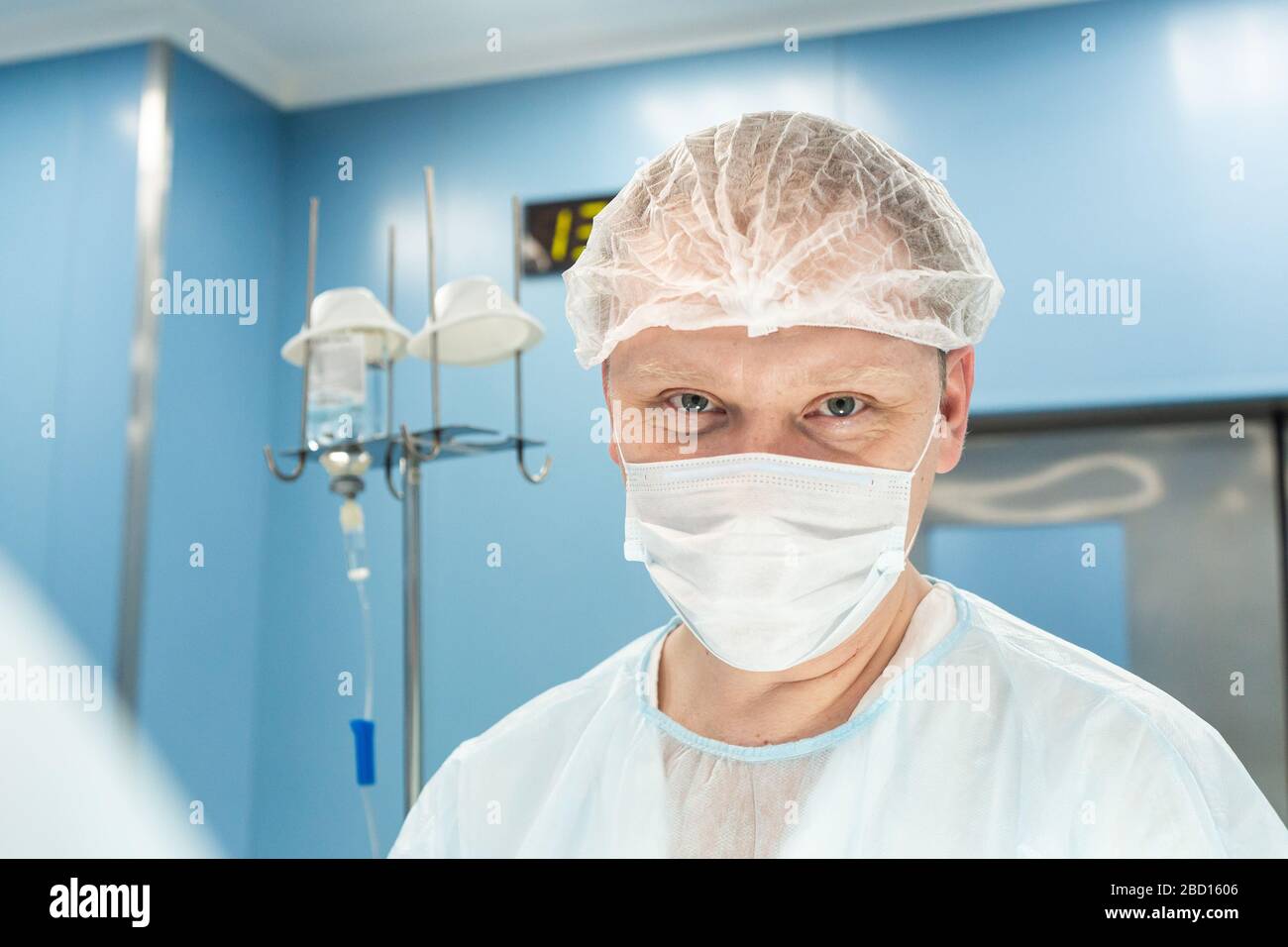 Portrait doctor performing surgical operation hi-res stock photography ...